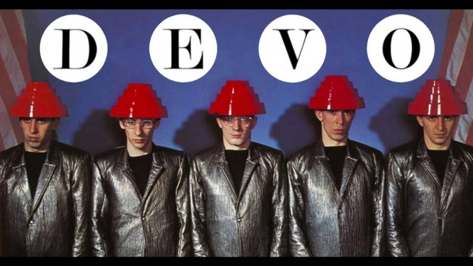 The Story Behind 'Whip It' By DEVO | Ultimate Guitar