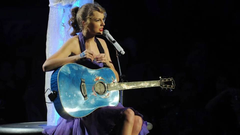 The Story Behind Taylor Swift's Rare Koi Fish Acoustic Guitar ...
