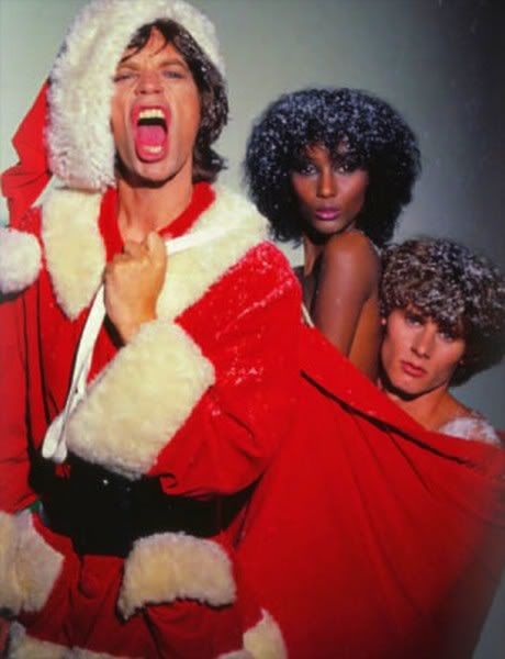 10 Pictures of Your Favorite Musicians Rocking Santa Suits | Ultimate ...