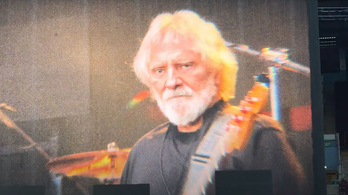 Watch: Geezer Butler Joins Foo Fighters Live to Play Black Sabbath's 'Paranoid' | Ultimate Guitar