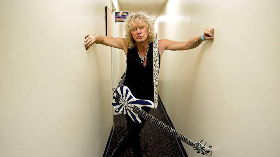 Def Leppard's Rick Savage: The Most Important Role Bass Guitarist Has ...