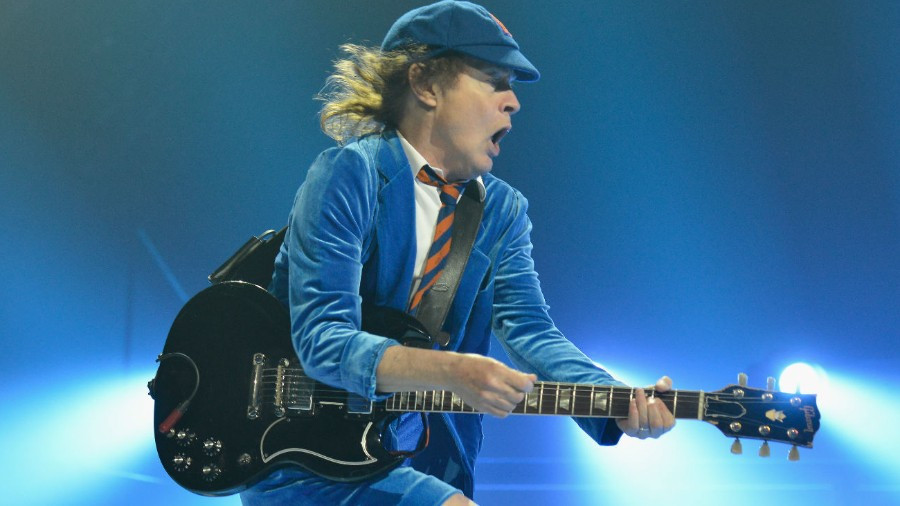 AC/DC's Angus Young Explains How He Defines Success, Speaks on Bassist ...