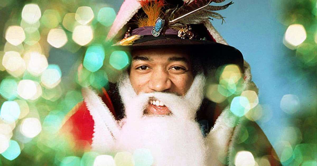10 Pictures of Your Favorite Musicians Rocking Santa Suits | Ultimate ...