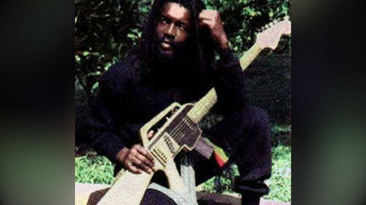 The Forgotten Story Behind the Infamous M-16 Guitar That Marked Reggae ...