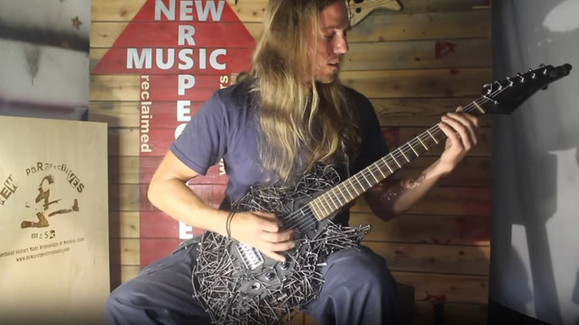 Uncomfortable-Looking Guitar With Body Made of Nails Is Selling for ...