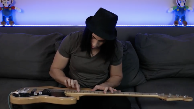 Watch: Dude Takes Bass Guitar, Plays It Like a Piano | Ultimate Guitar